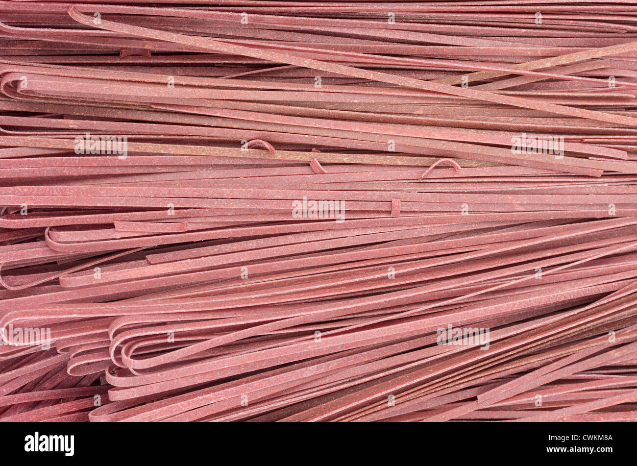 Red pasta on display at the farmers market Stock Photo - Alamy