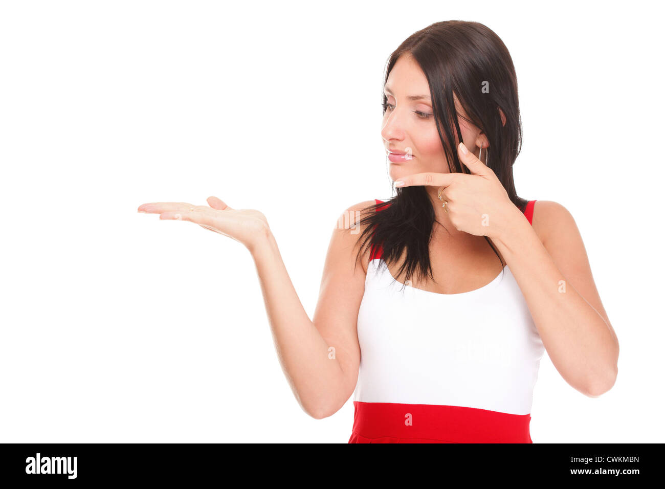Young woman showing product with open hand palm - excited expression on ...