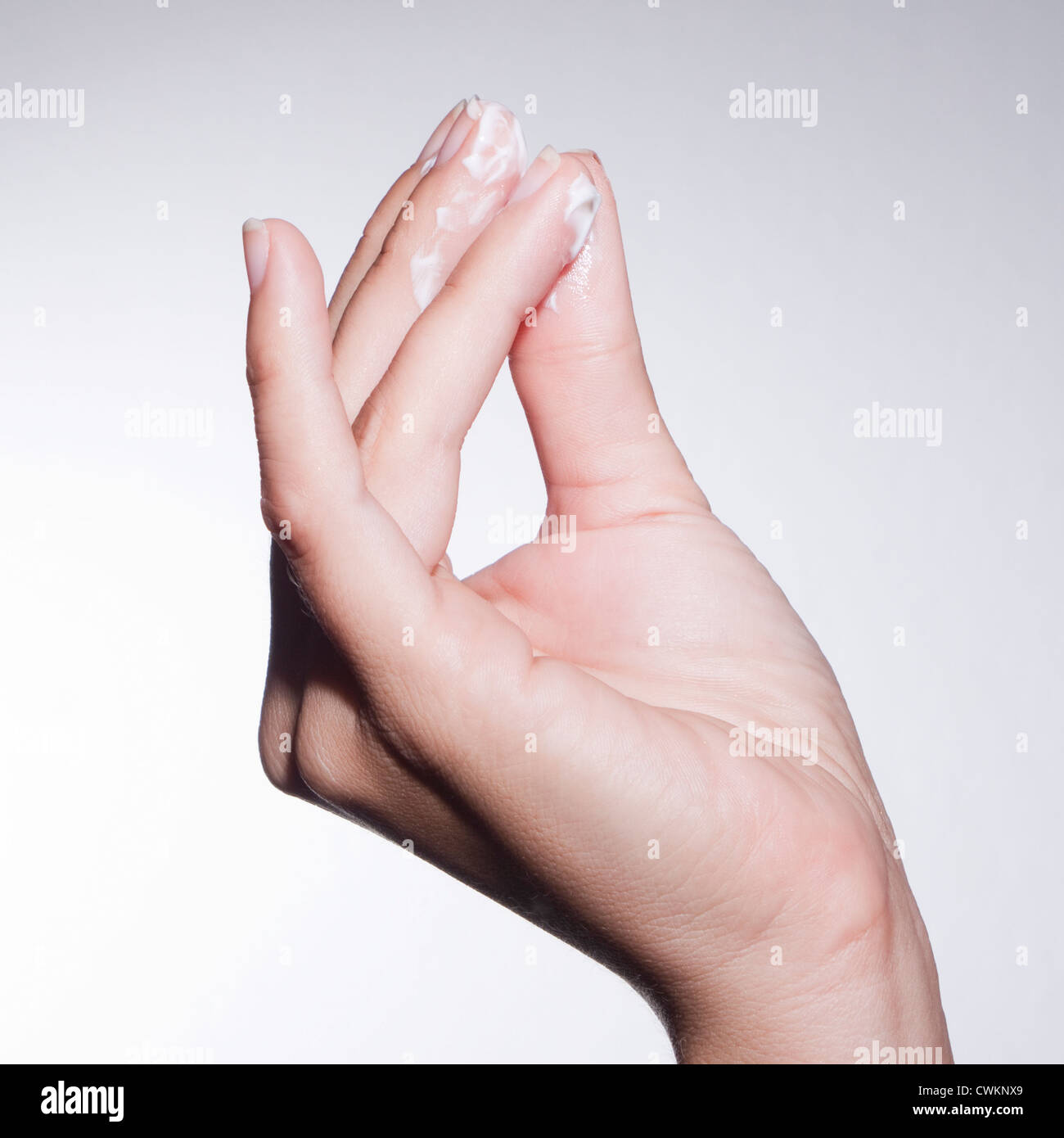 woman hands using skin cream Stock Photo - Alamy