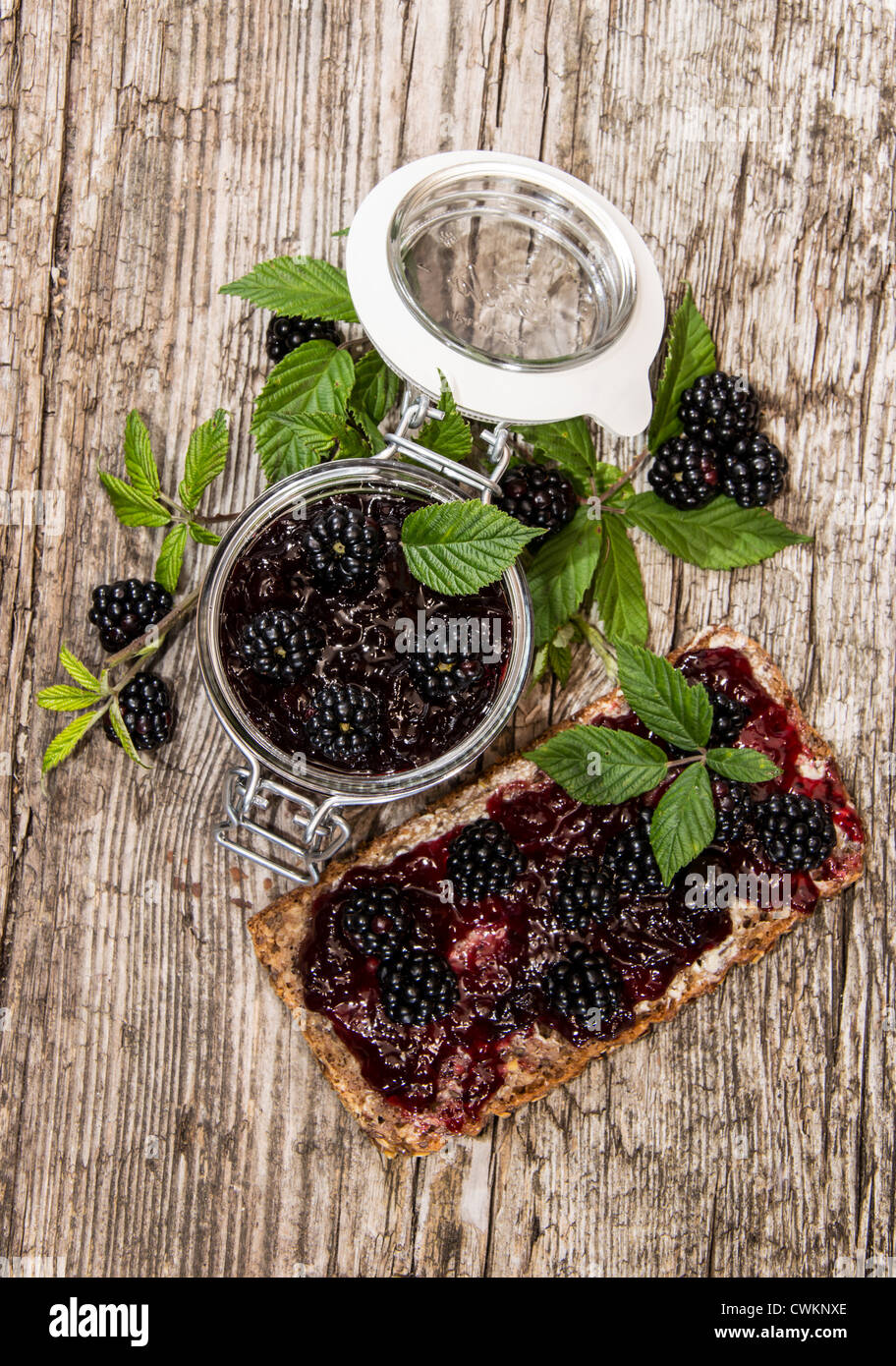 Fresh made Blackberry Jam on wooden background Stock Photo - Alamy