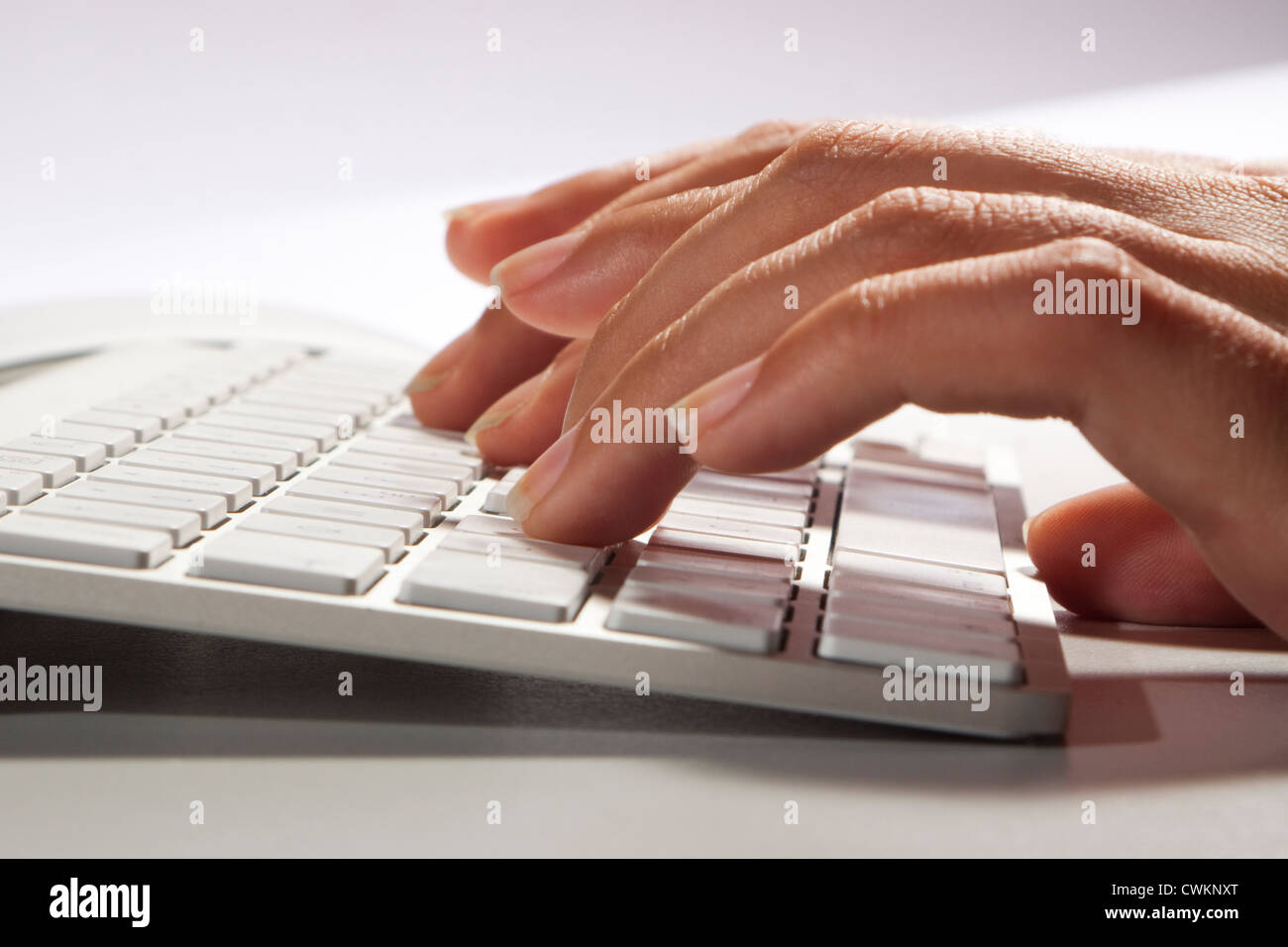 female hand writing on a keyboard Stock Photo - Alamy