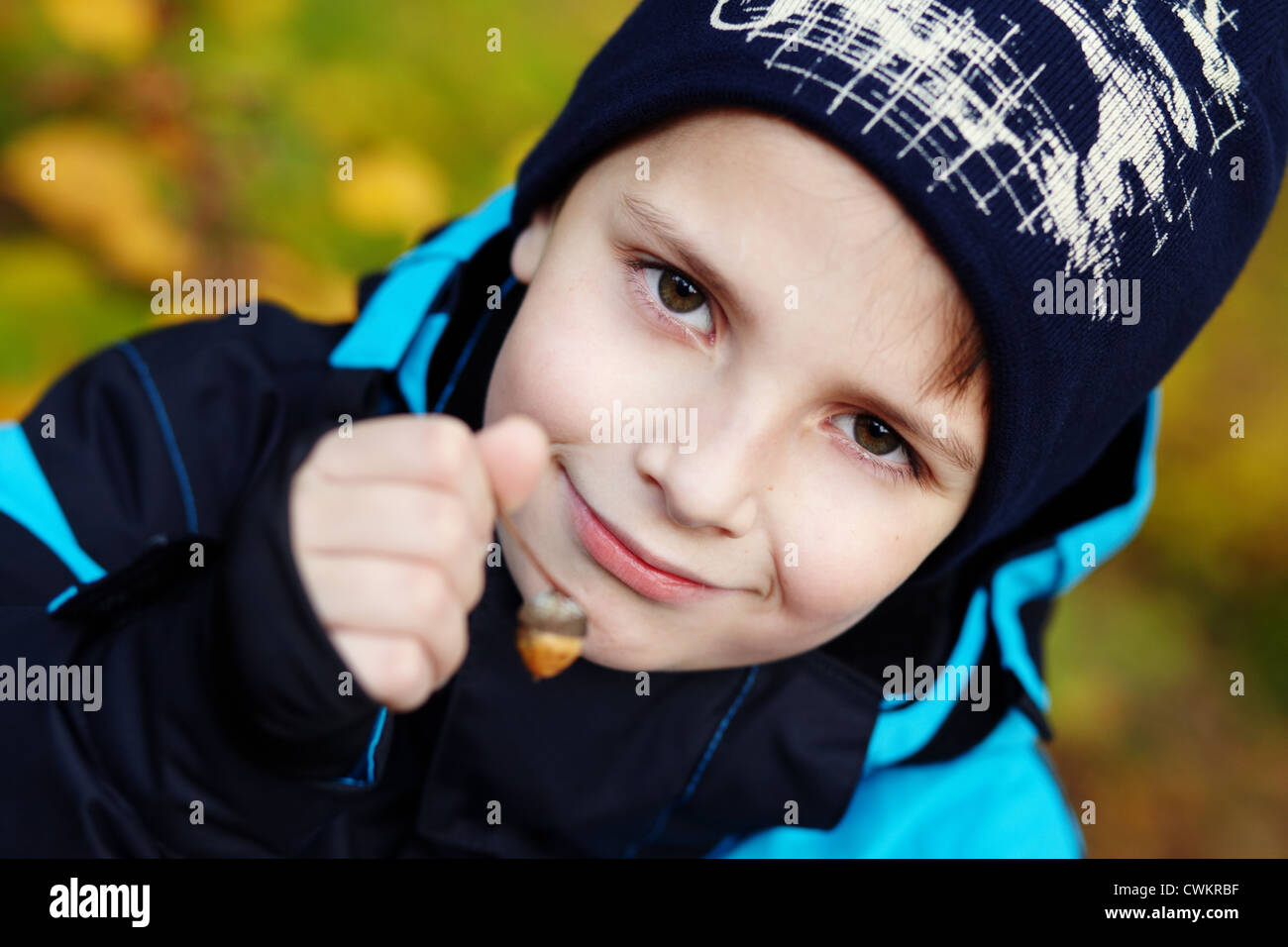 Boy with Acorn Stock Photo - Alamy