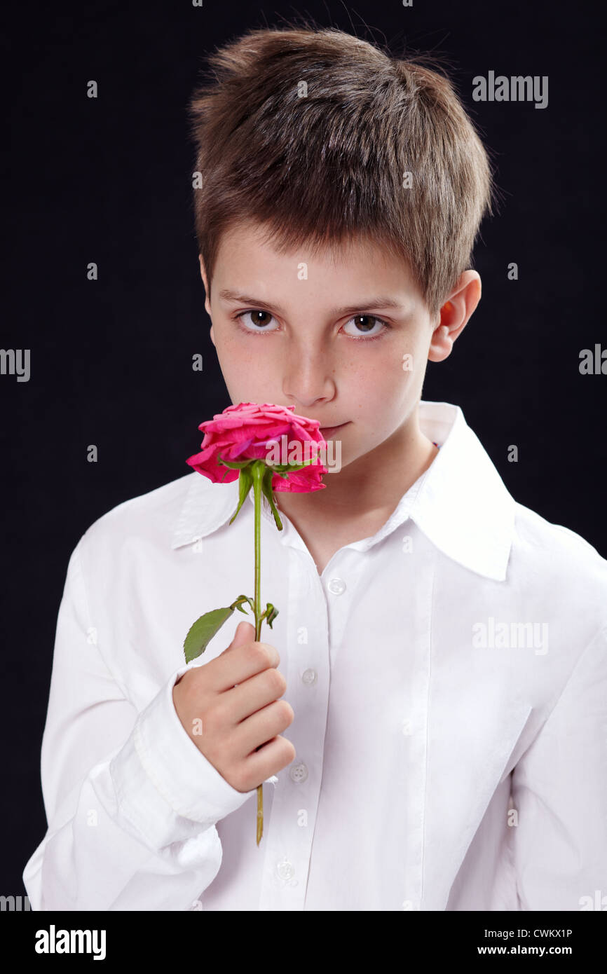 Boy with Rose Stock Photo - Alamy