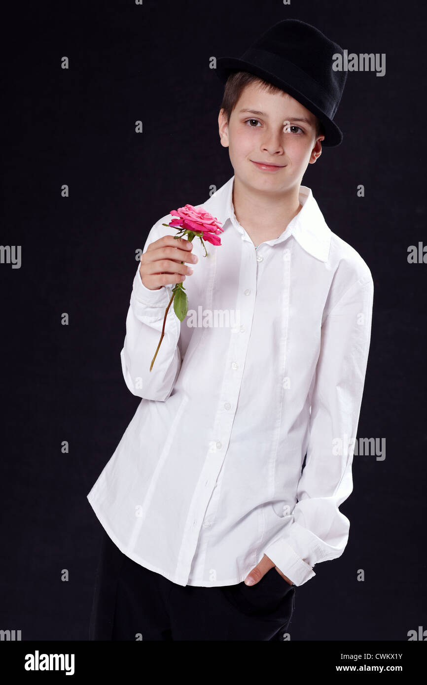 Boy with Rose Stock Photo - Alamy