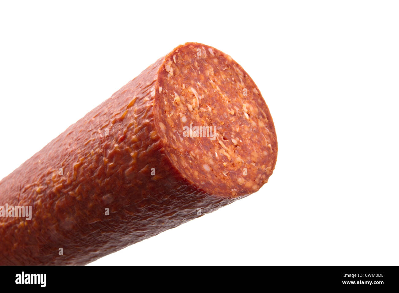 Big salami sausage isolated on white background Stock Photo - Alamy