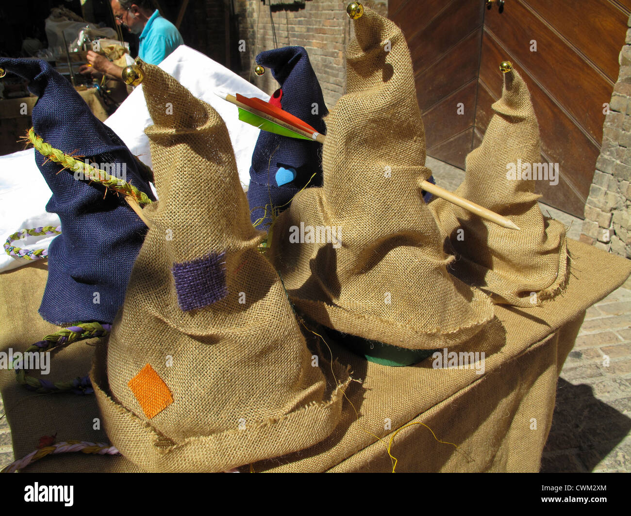 Medieval hats made of Hessian with arrows through the top Stock Photo ...