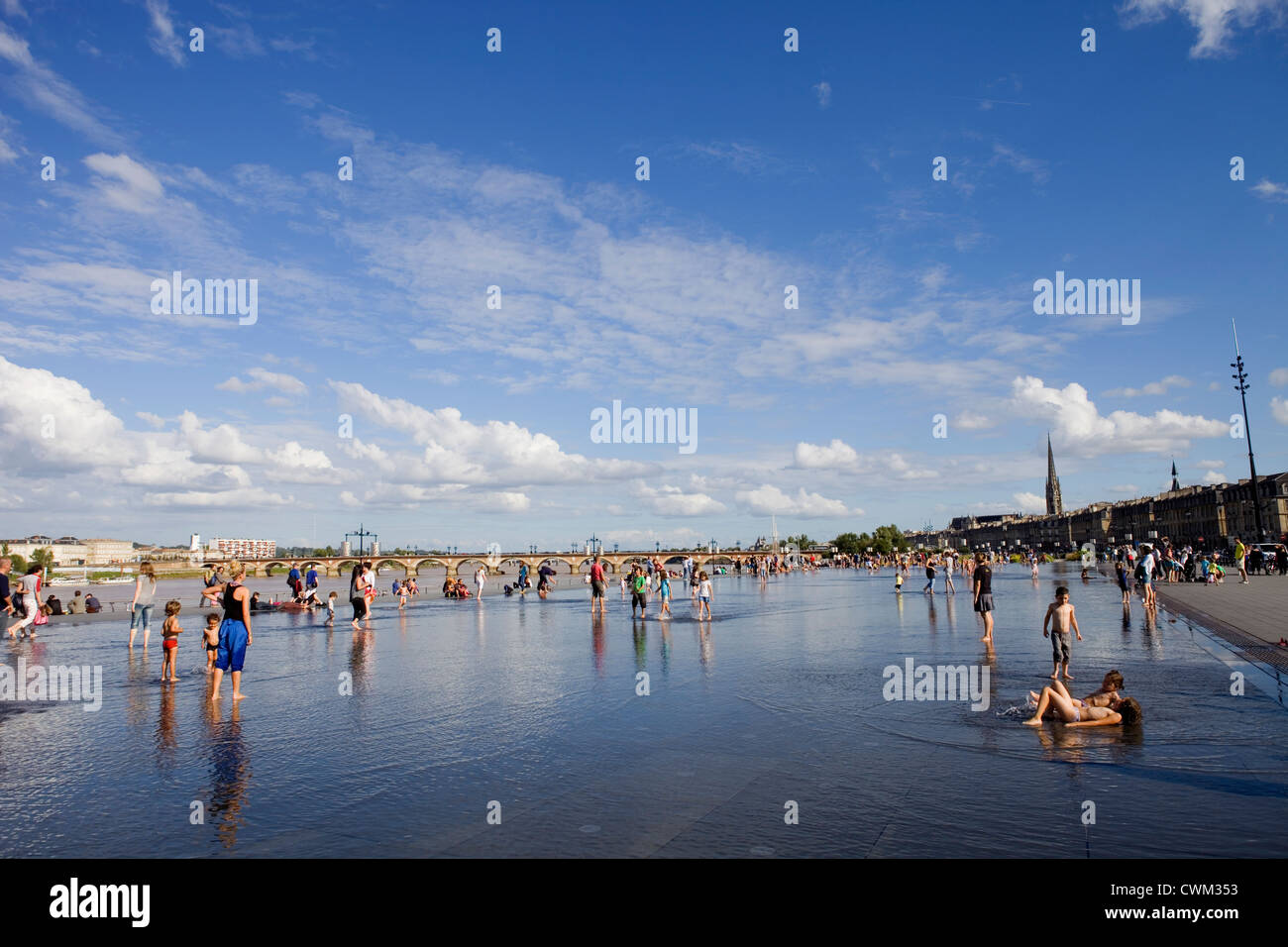 Bordeaux water mirror full of people in one of the hotest summer days ...