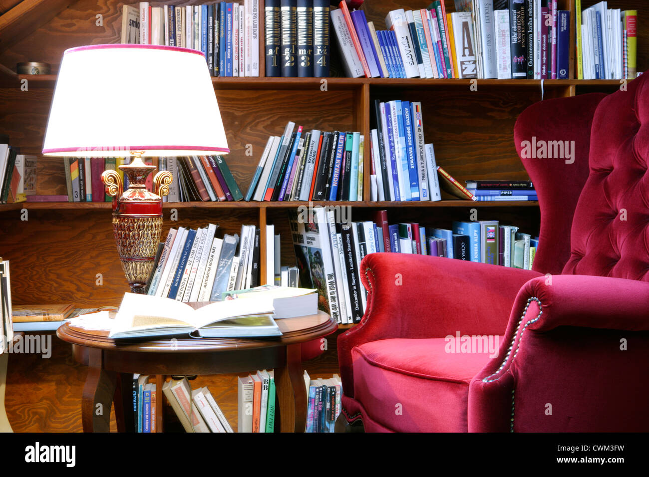 library with armchair Stock Photo - Alamy
