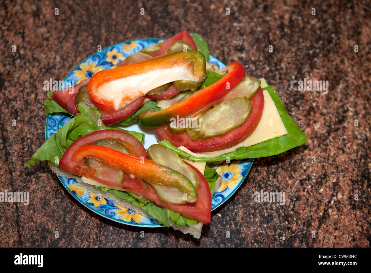 Typical open faced Polish breakfast sandwich with red peppers, pickles ...