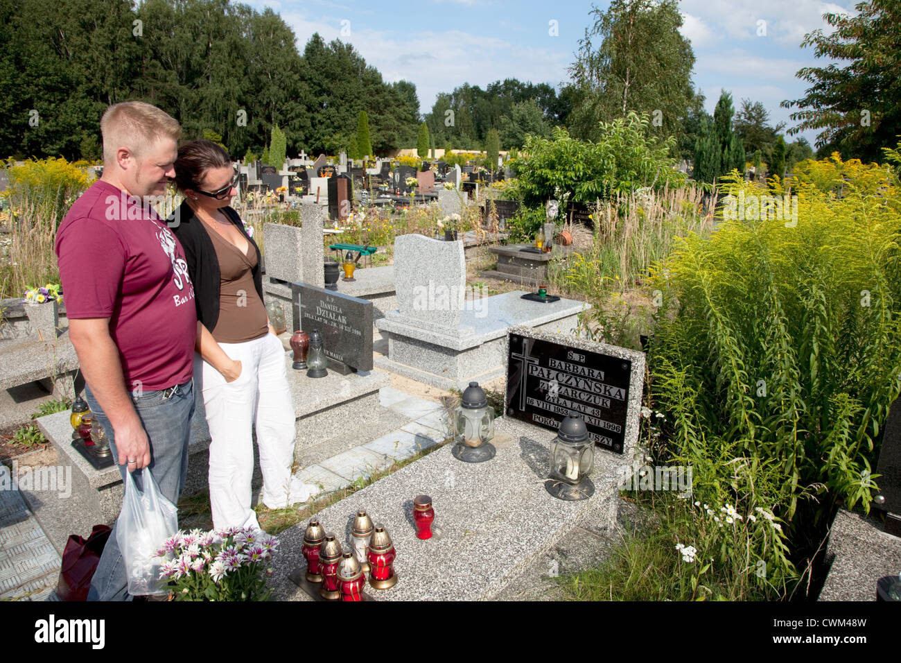 Someone Mourning At A Grave