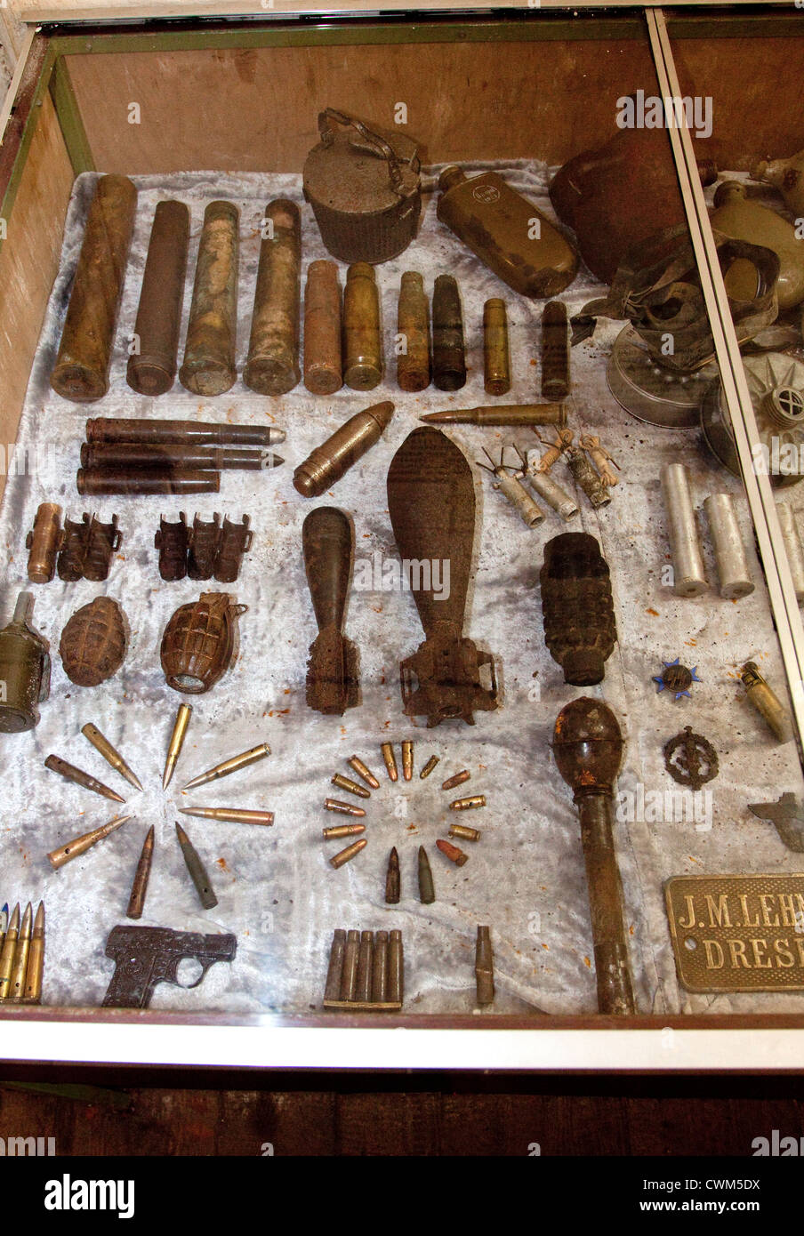 German World War II weapons including bullets shells bombs pistol hand ...