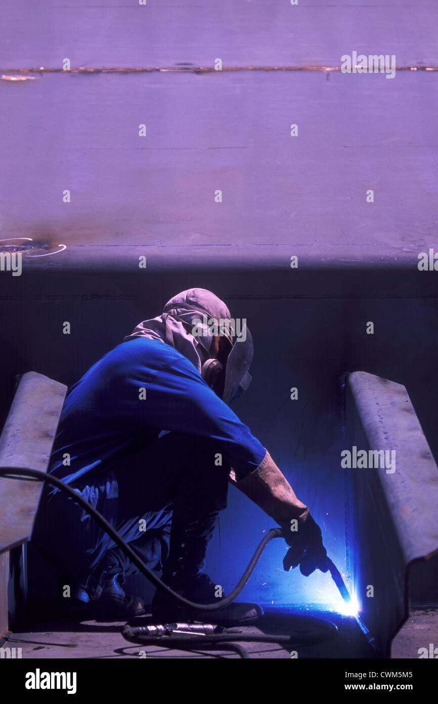 In the shadow of the shipyard hi-res stock photography and images - Alamy