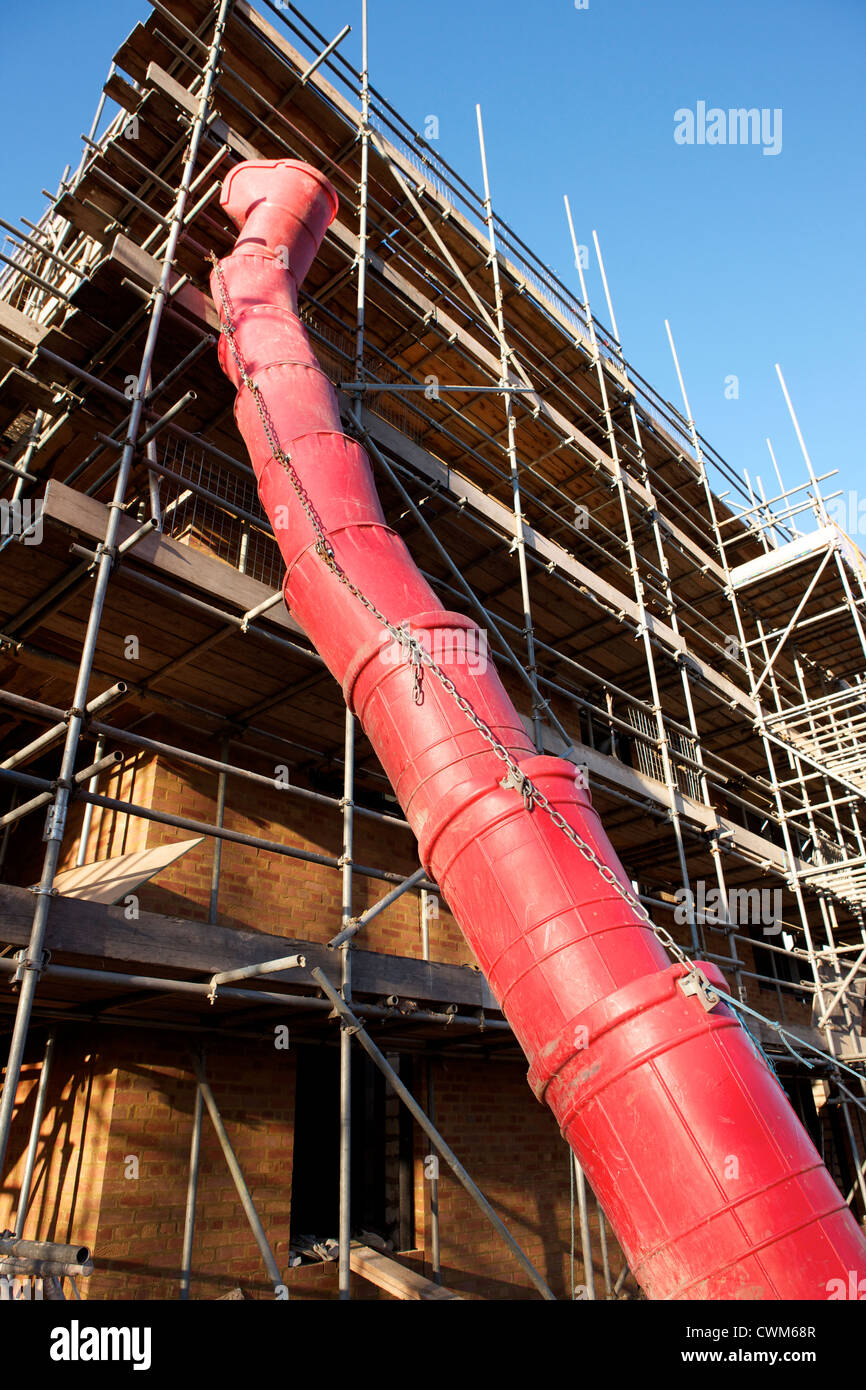 rubbish chute on scaffolding Stock Photo - Alamy