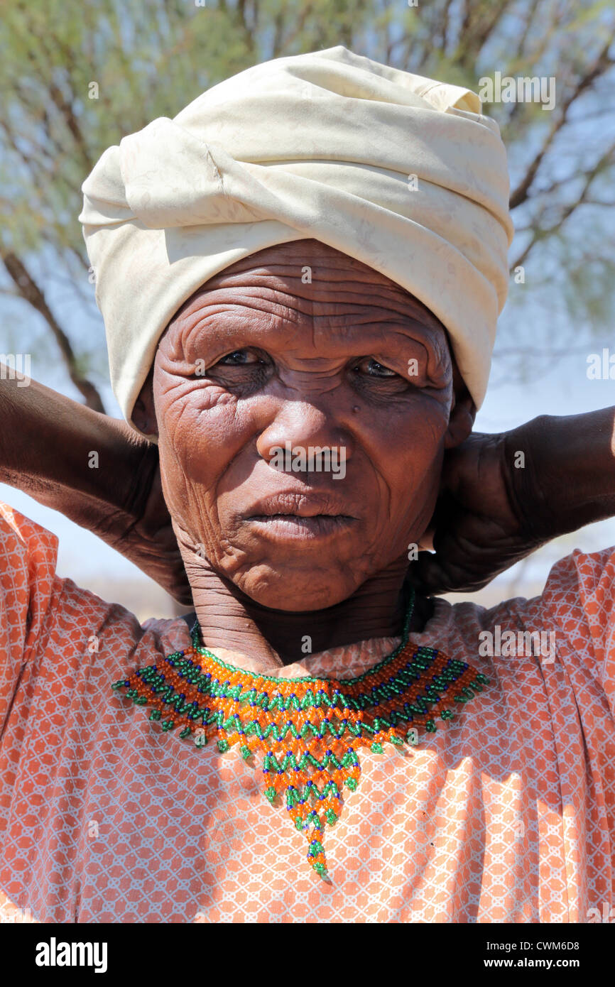 old woman from the San tribe with handmade beaded necklace, Kalahari ...