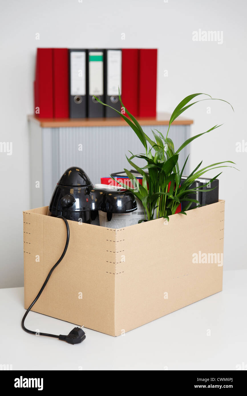 Germany, Personal stuff in box at office Stock Photo - Alamy
