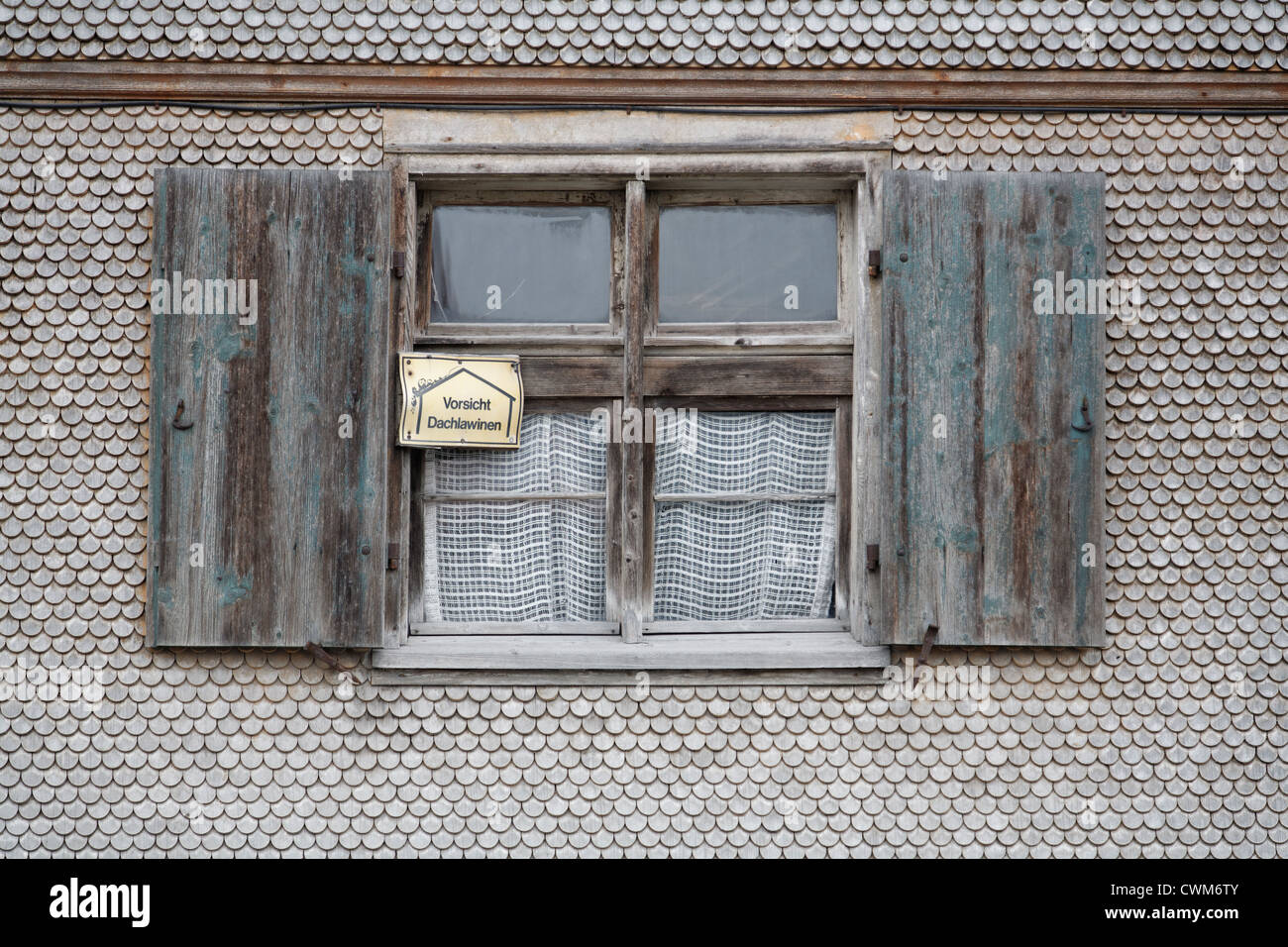 Germany, Bavaria, Clapboard house with open window Stock Photo - Alamy