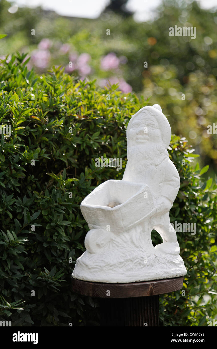 Germany, Garden gnome in garden Stock Photo - Alamy