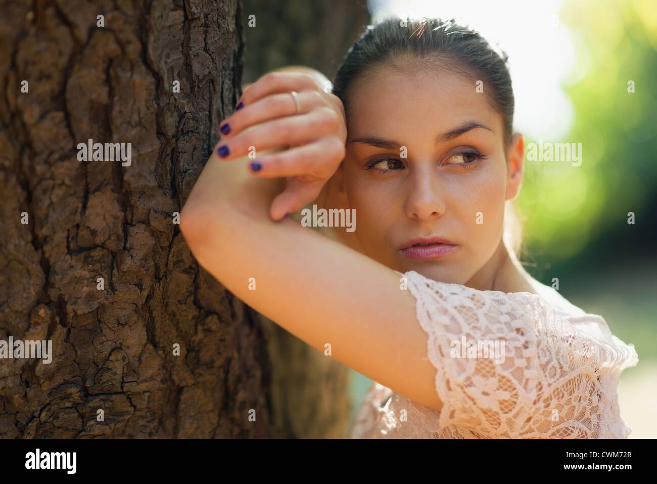 Lean against tree hi-res stock photography and images - Alamy
