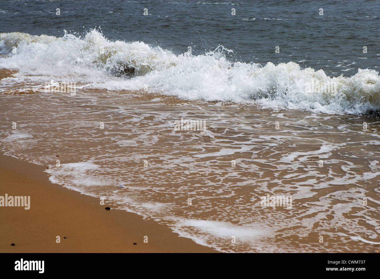 Detail of waves lapping on beach hi-res stock photography and images ...