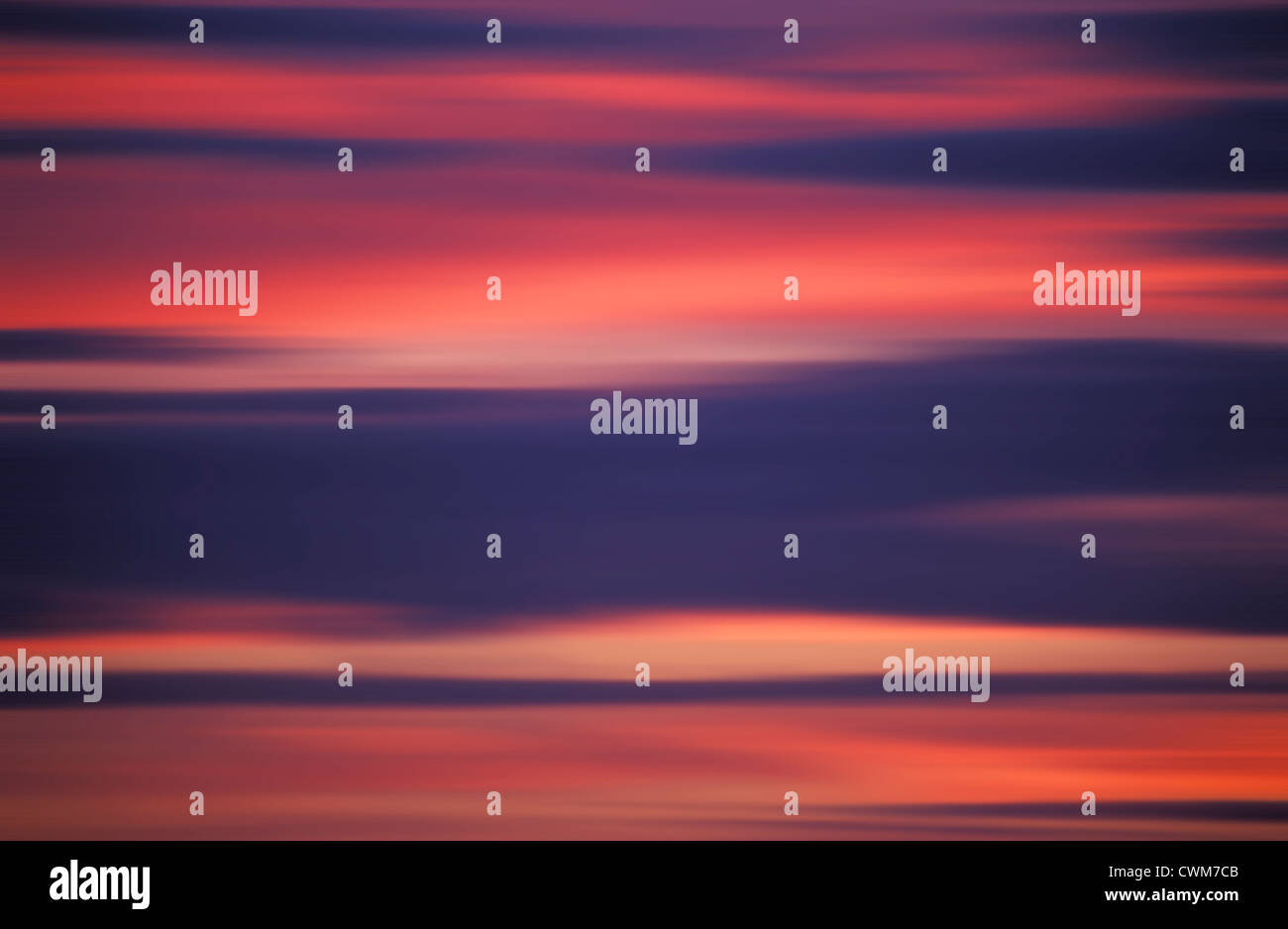 Full frame view of pink and grey sunset sky Stock Photo - Alamy