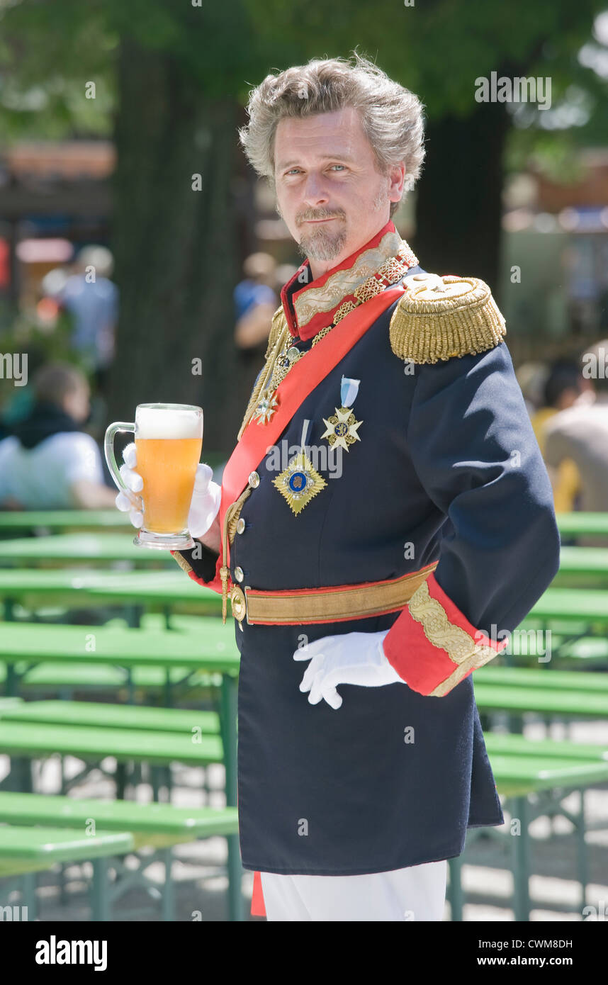 Germany, Man as King Ludwig of Bavaria with beer mug, portrait Stock ...