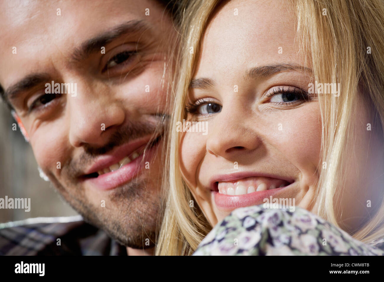 Couple smiling, portrait Stock Photo - Alamy