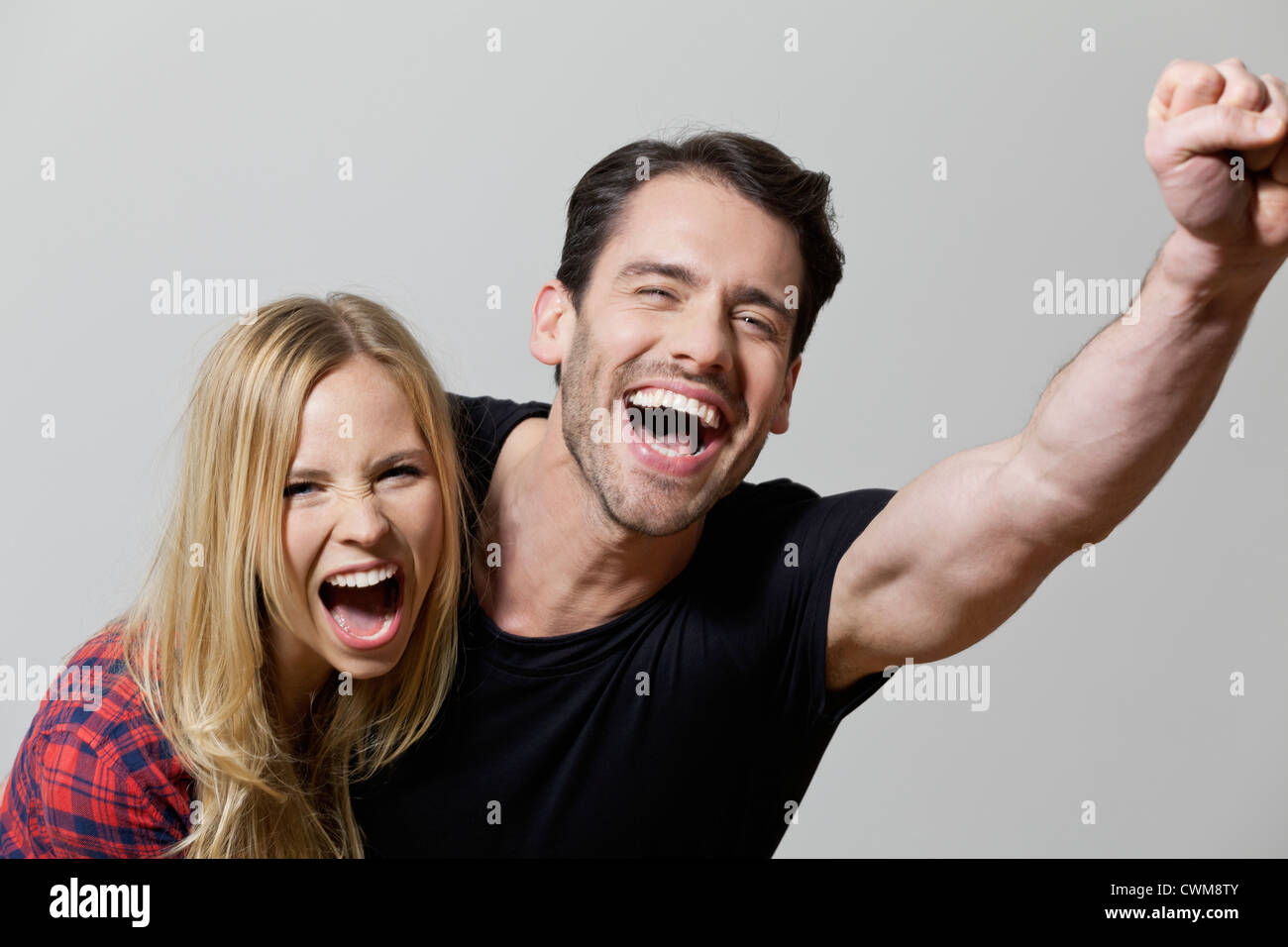 Couple shouting against white background, close up Stock Photo - Alamy