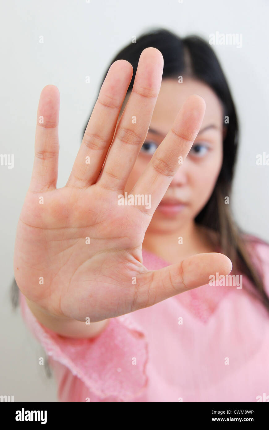 Stop sign woman hi-res stock photography and images - Alamy