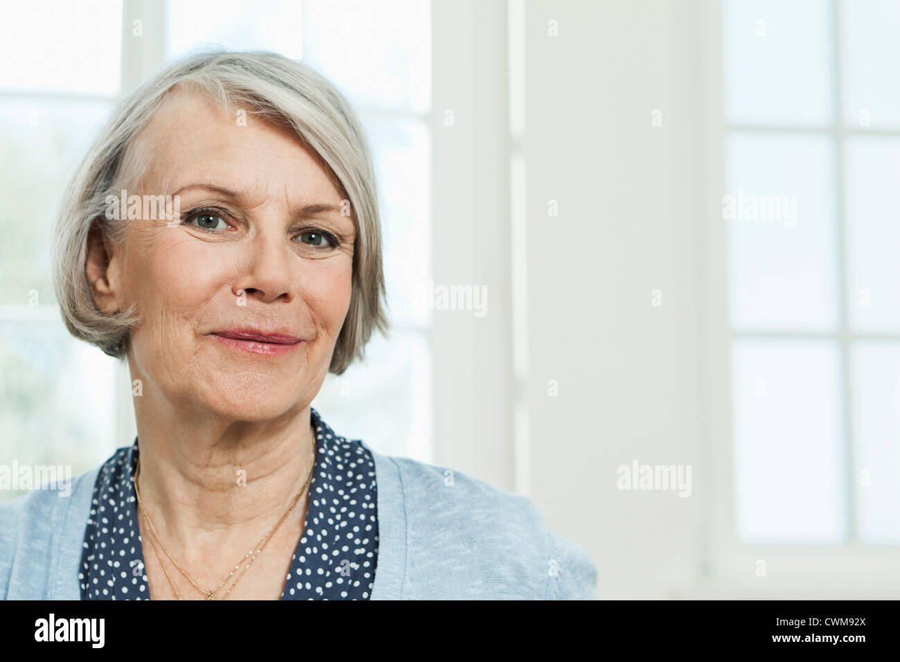 Germany, Berlin, Senior woman smiling, portrait Stock Photo - Alamy