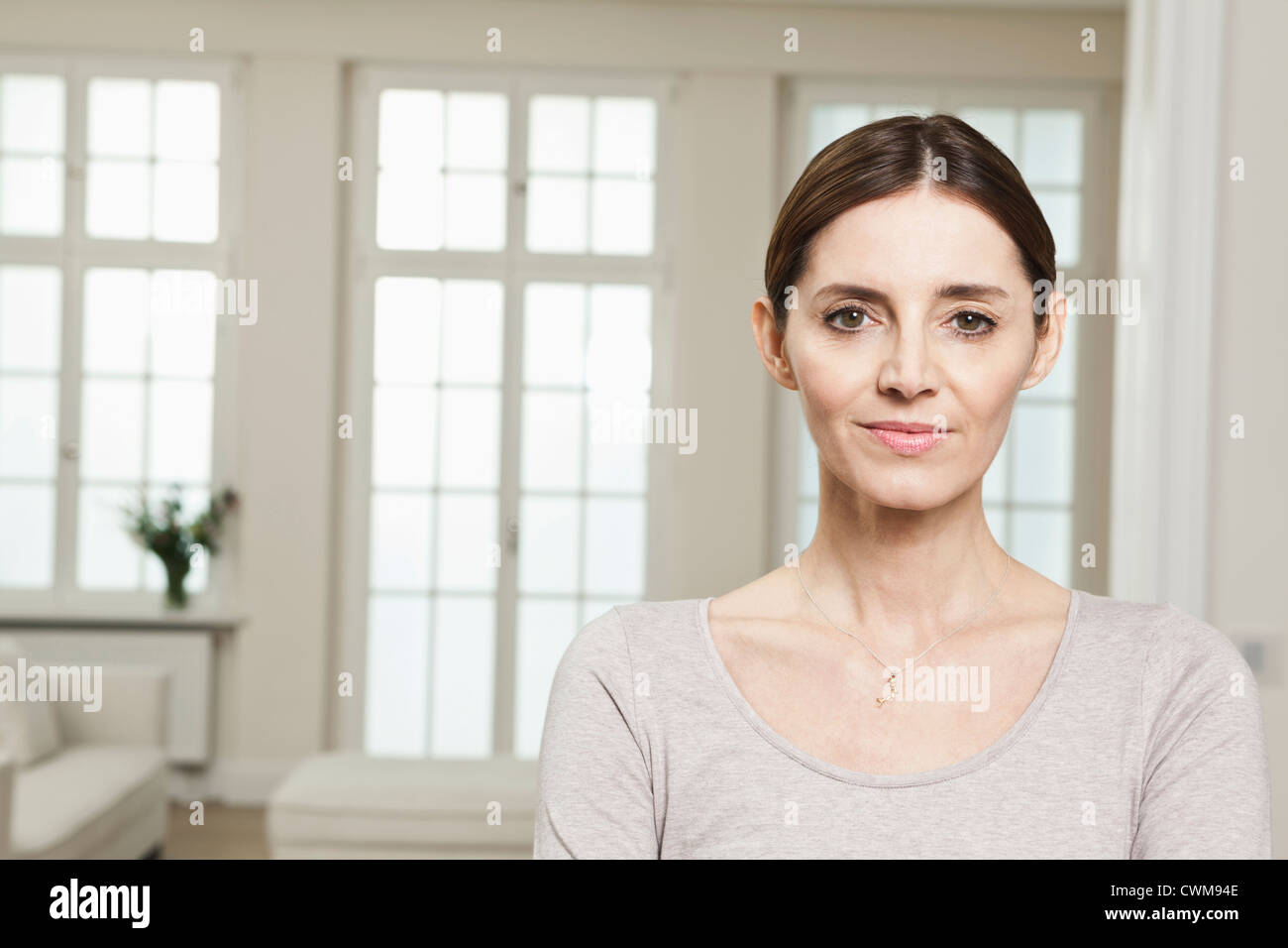 Germany, Berlin, Mature woman smiling, portrait Stock Photo - Alamy