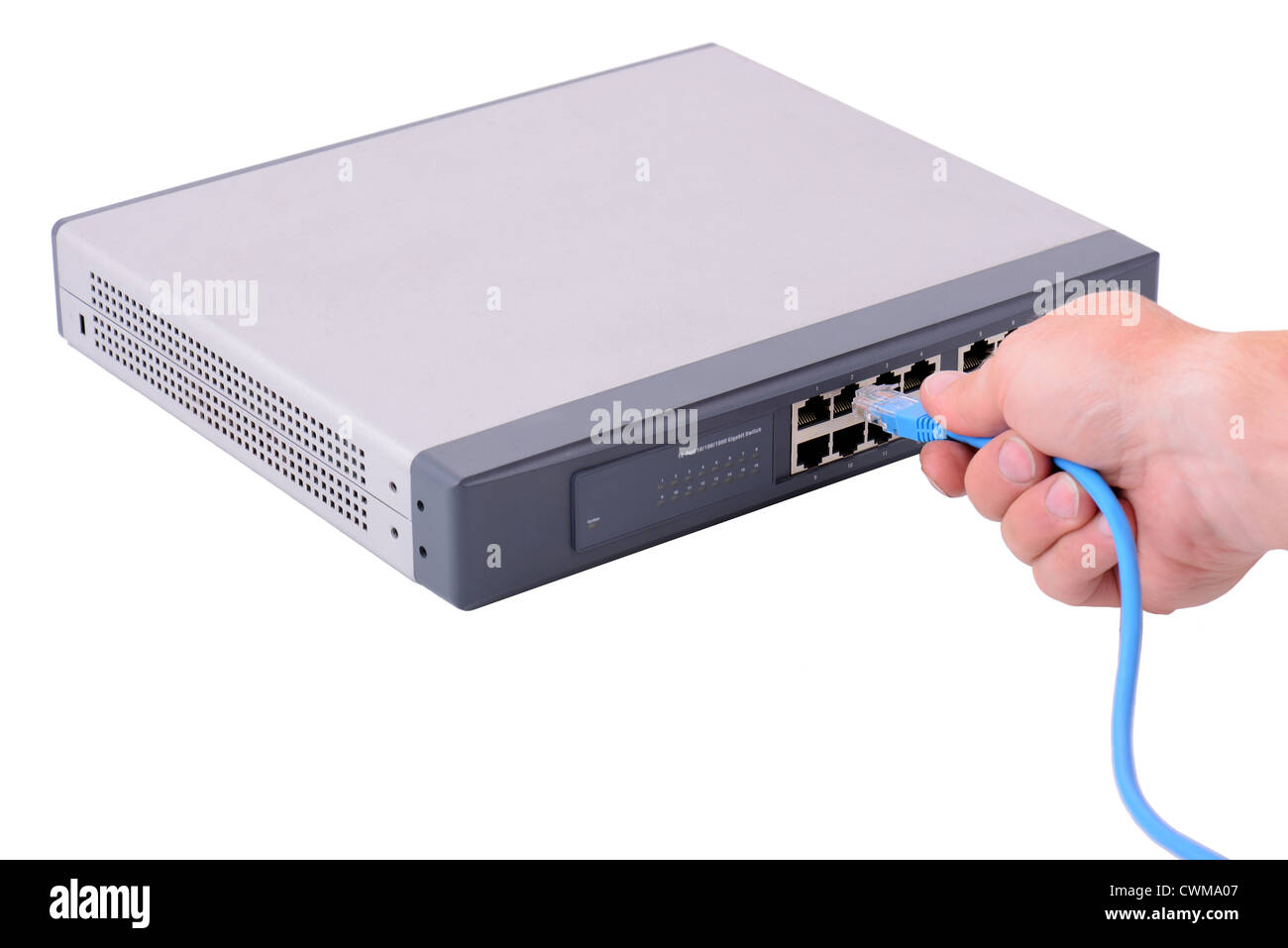 hand pluging an rj45 connector in to a network hub Stock Photo - Alamy