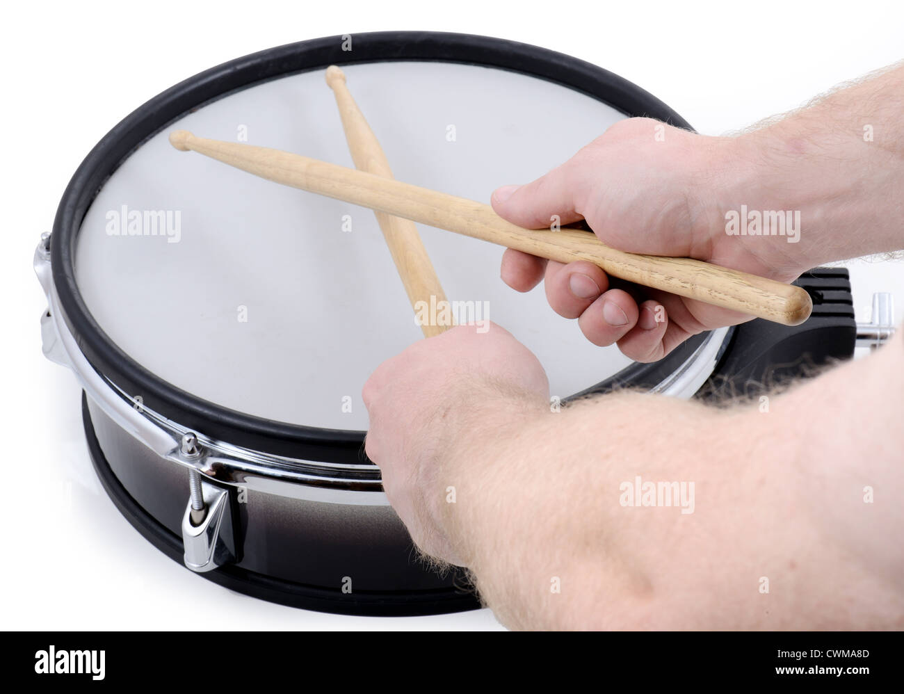 hands playing drums on white background Stock Photo - Alamy