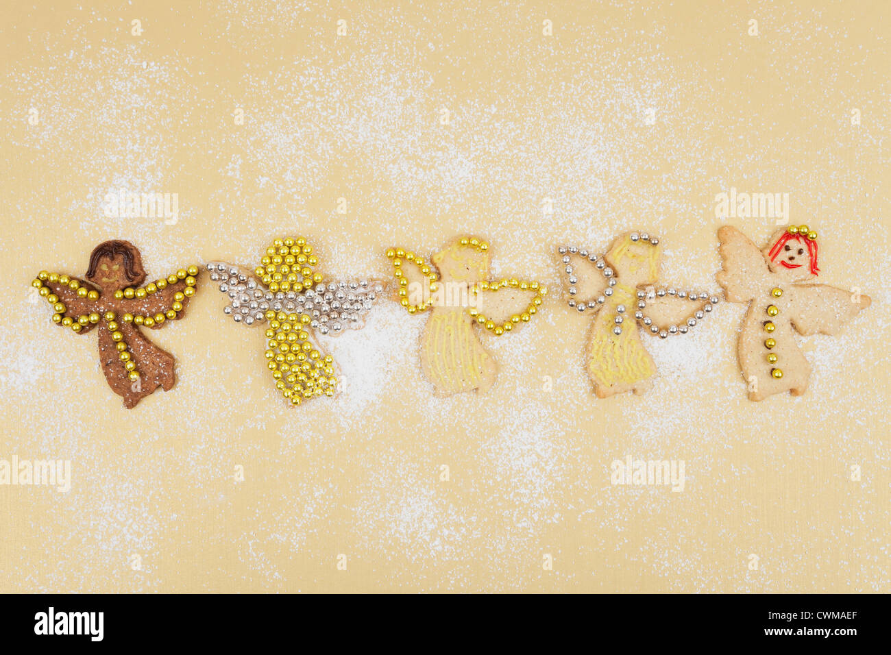 Variety of christmas angel cookies with icing sugar Stock Photo - Alamy