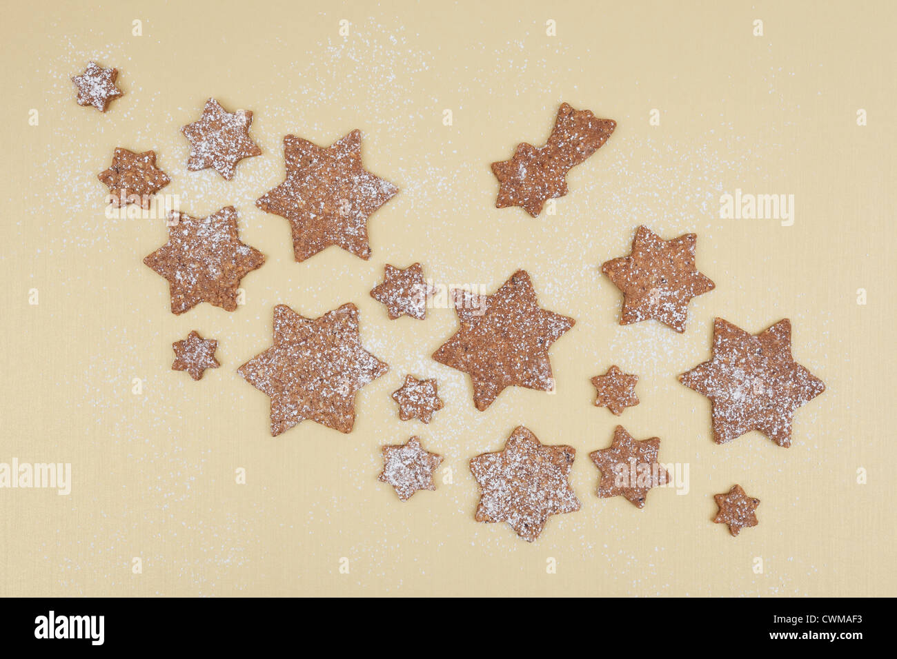 Baked star shape cookies with icing sugar Stock Photo - Alamy