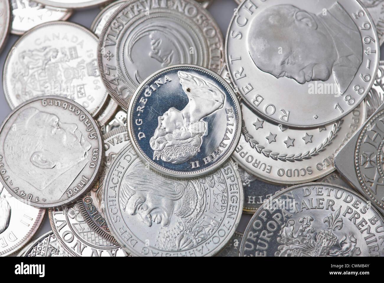 Variety of silver coins, close up Stock Photo - Alamy