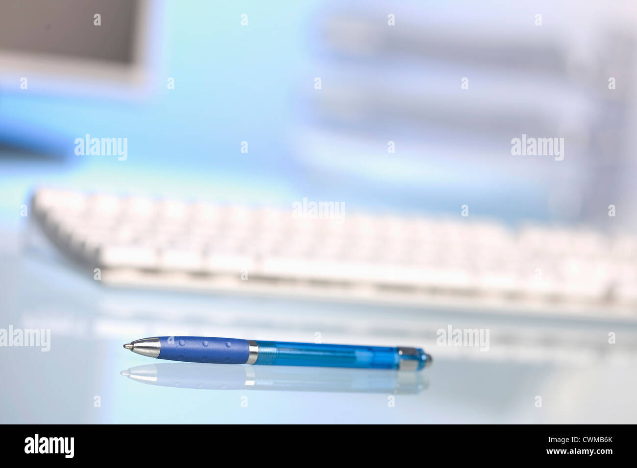 Modern office desktop with pen, close up Stock Photo - Alamy