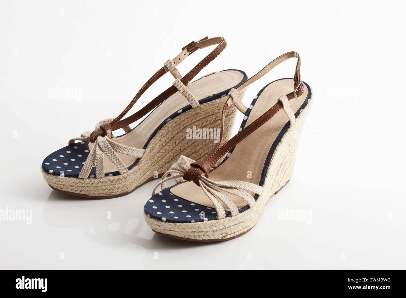 Platform shoes on white background Stock Photo - Alamy