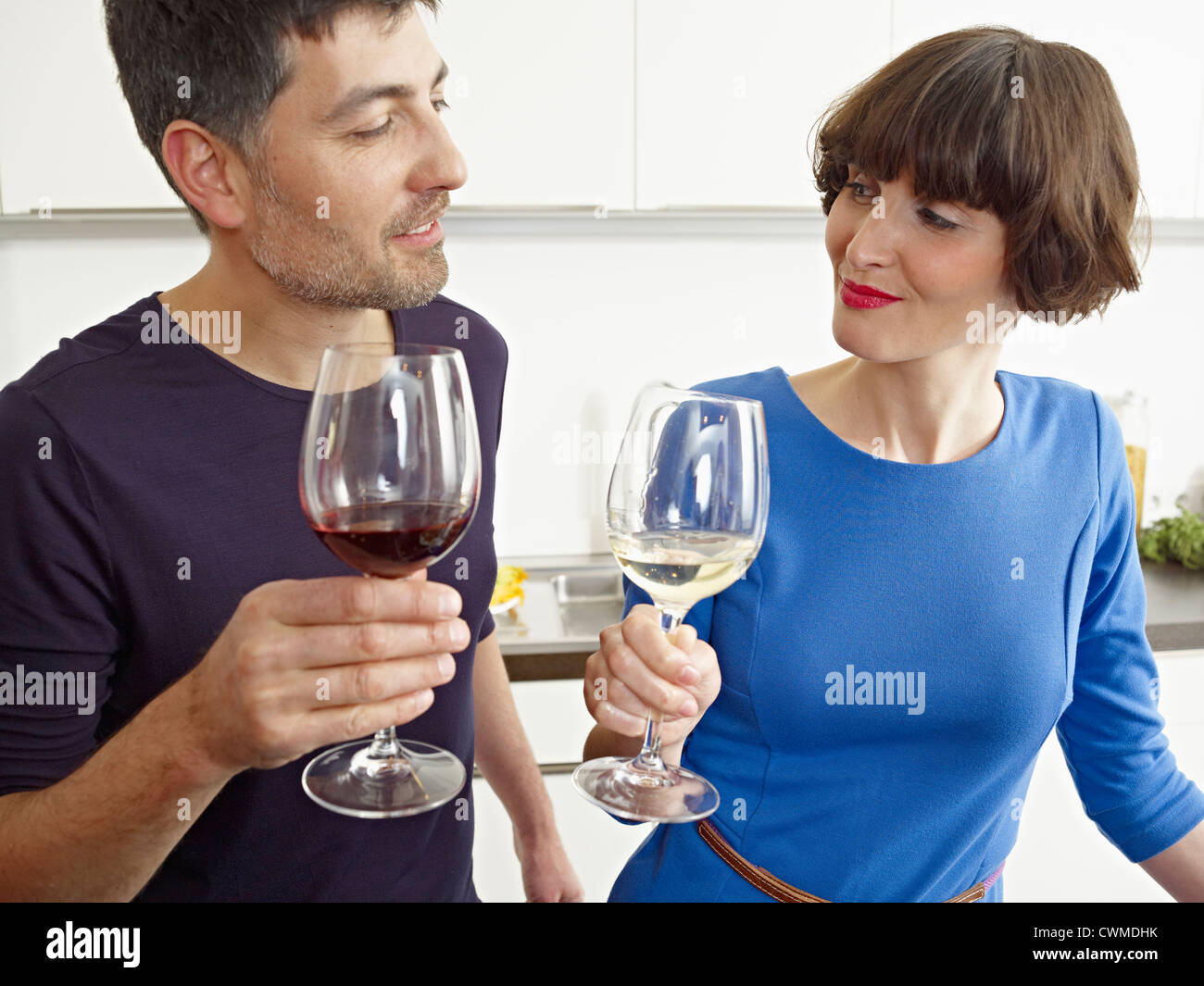 Germany, Cologne, Man and woman drinking wine Stock Photo - Alamy