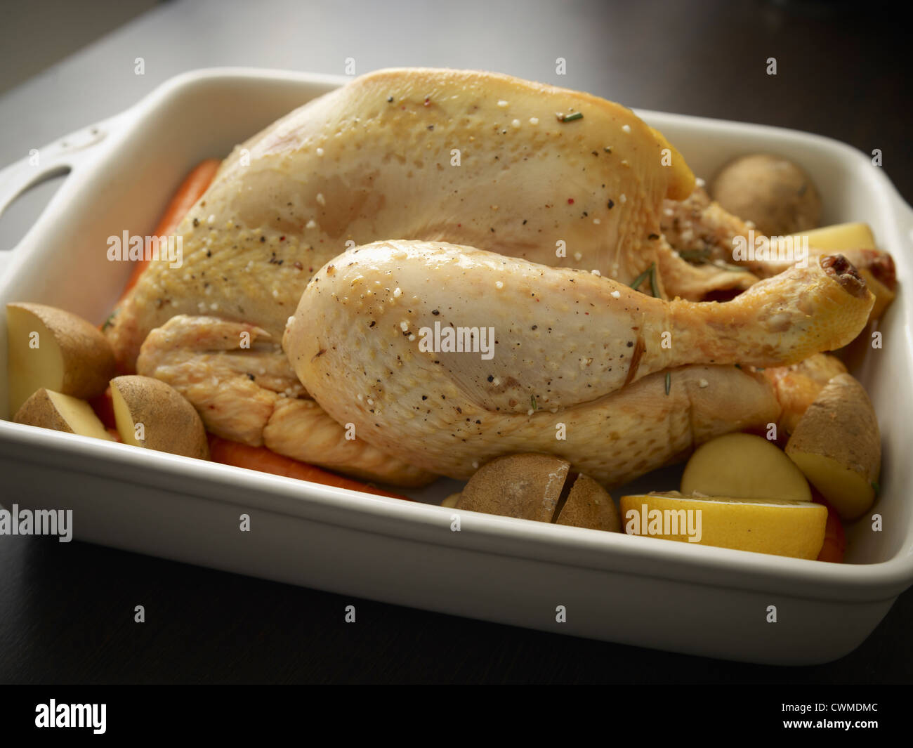 Germany, Cologne, Roast chicken in tray, close up Stock Photo - Alamy