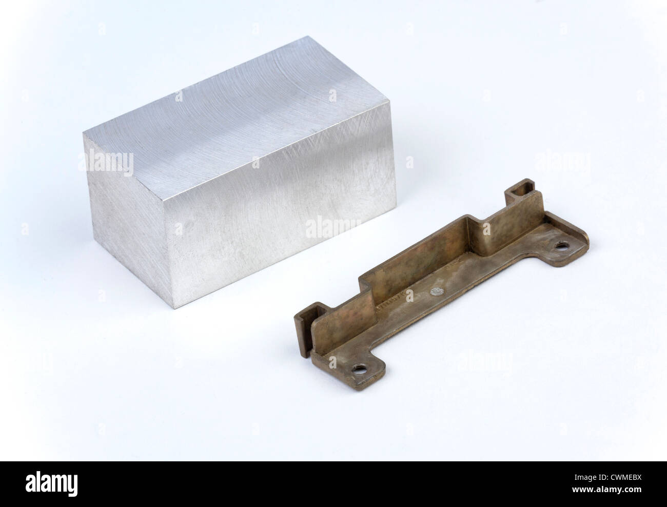 machined magnesium metal block and diecast magnesium bracket Stock ...