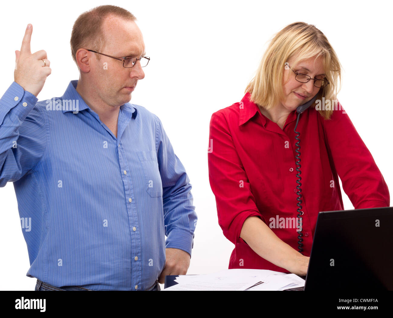Two business people working Stock Photo - Alamy