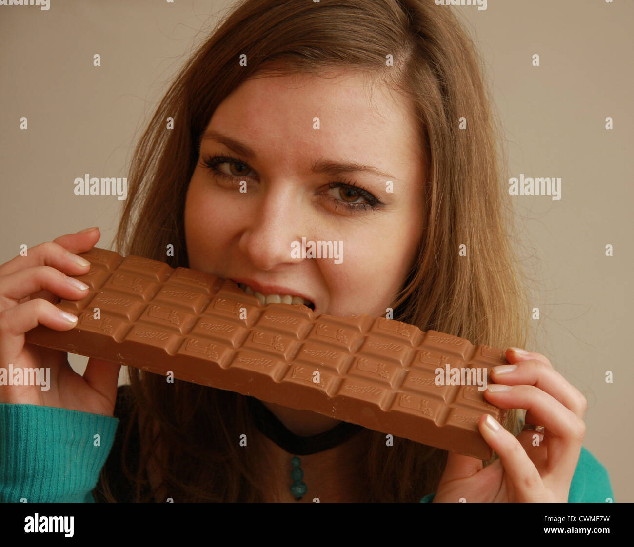 Woman eating dark chocolate mouth hi-res stock photography and images ...