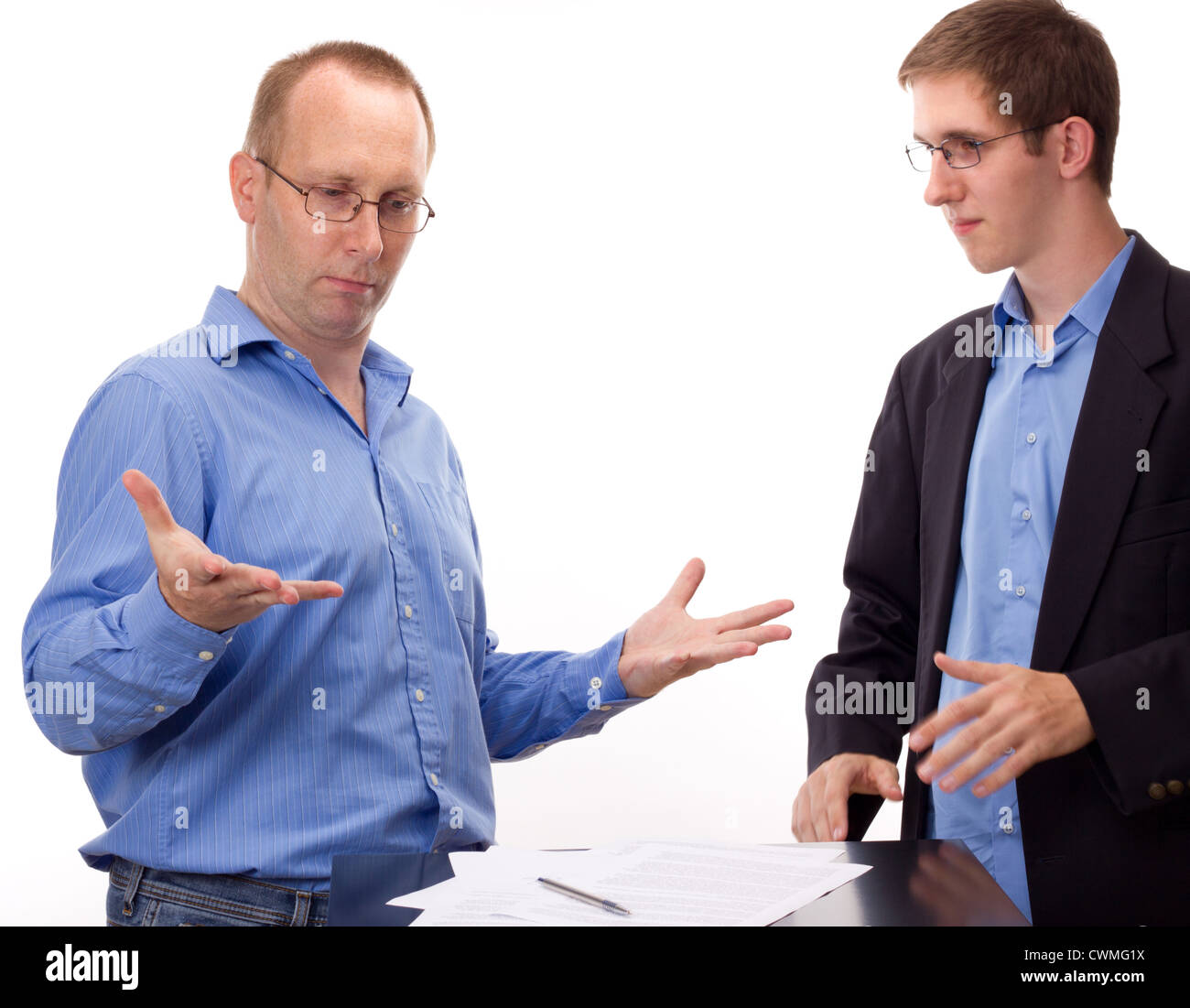 Two business people working Stock Photo - Alamy