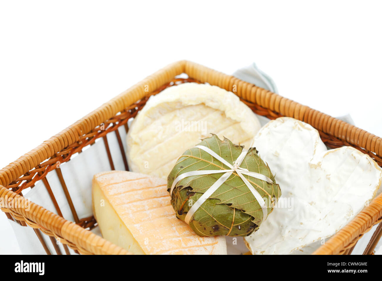 cheese in basket close up Stock Photo - Alamy