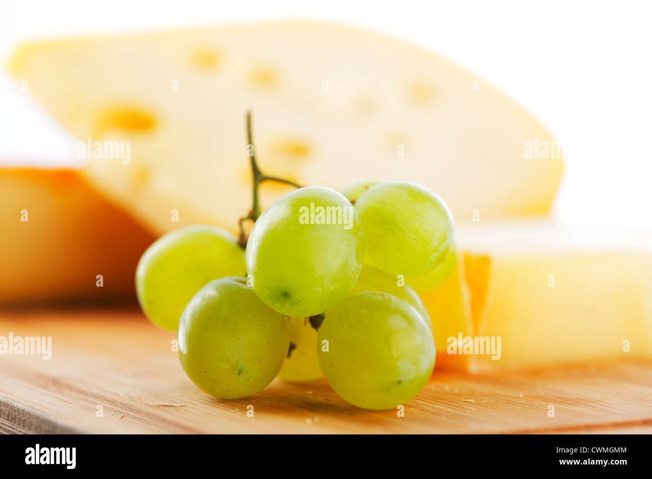 cheese and grape close up Stock Photo - Alamy