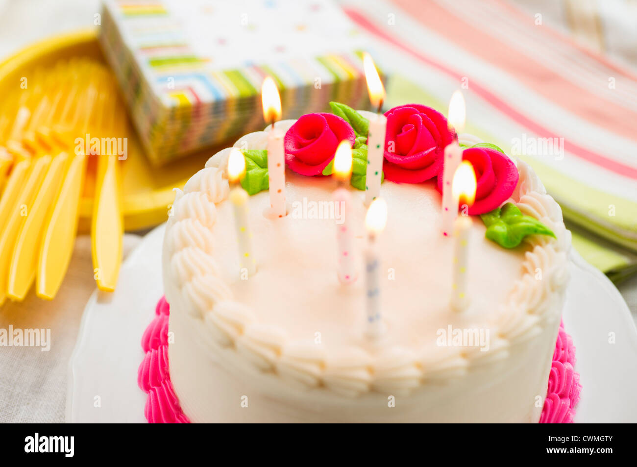 Cake with candles Stock Photo - Alamy
