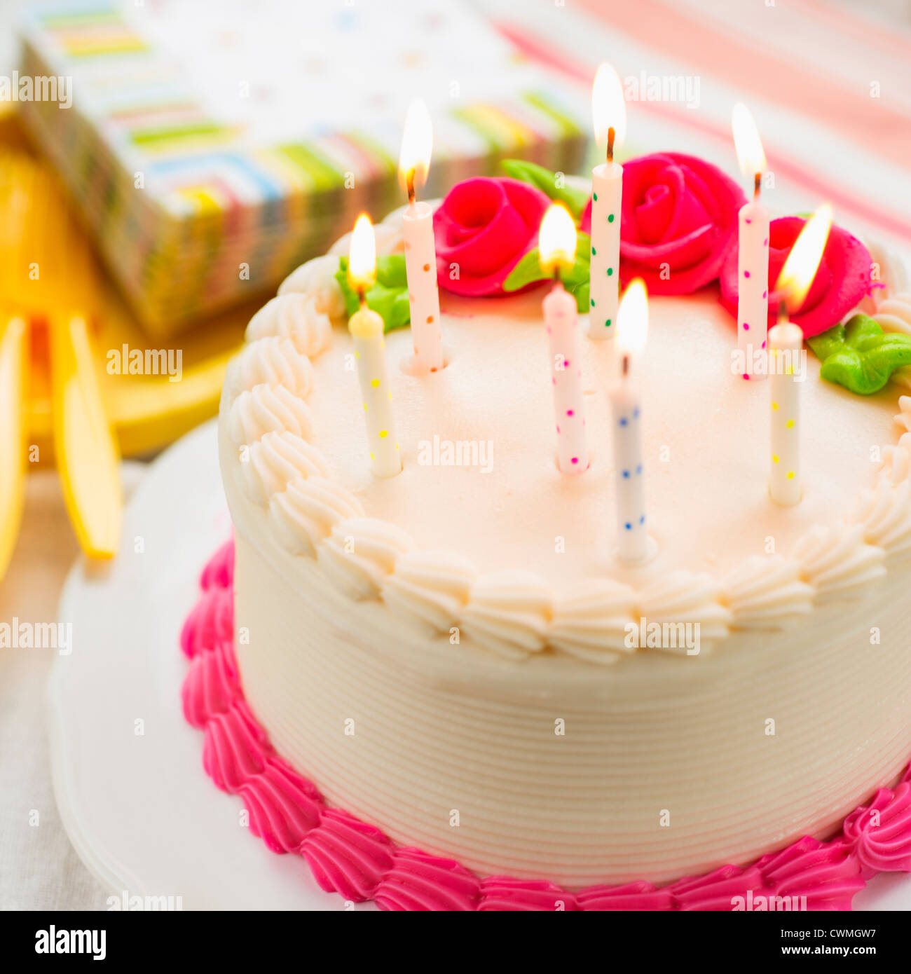Cake with candles Stock Photo - Alamy