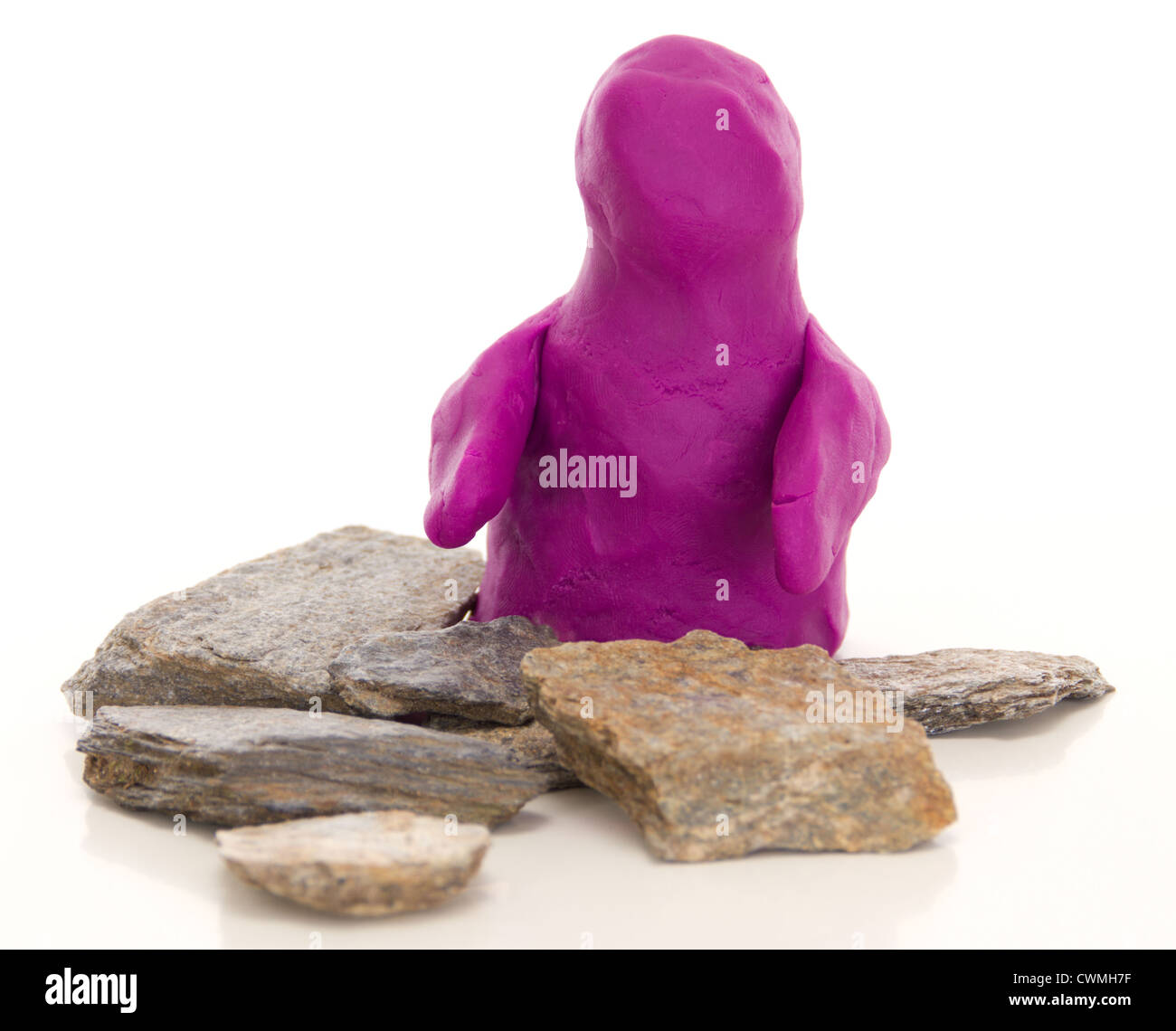 Modelling clay figure with iron Stock Photo - Alamy