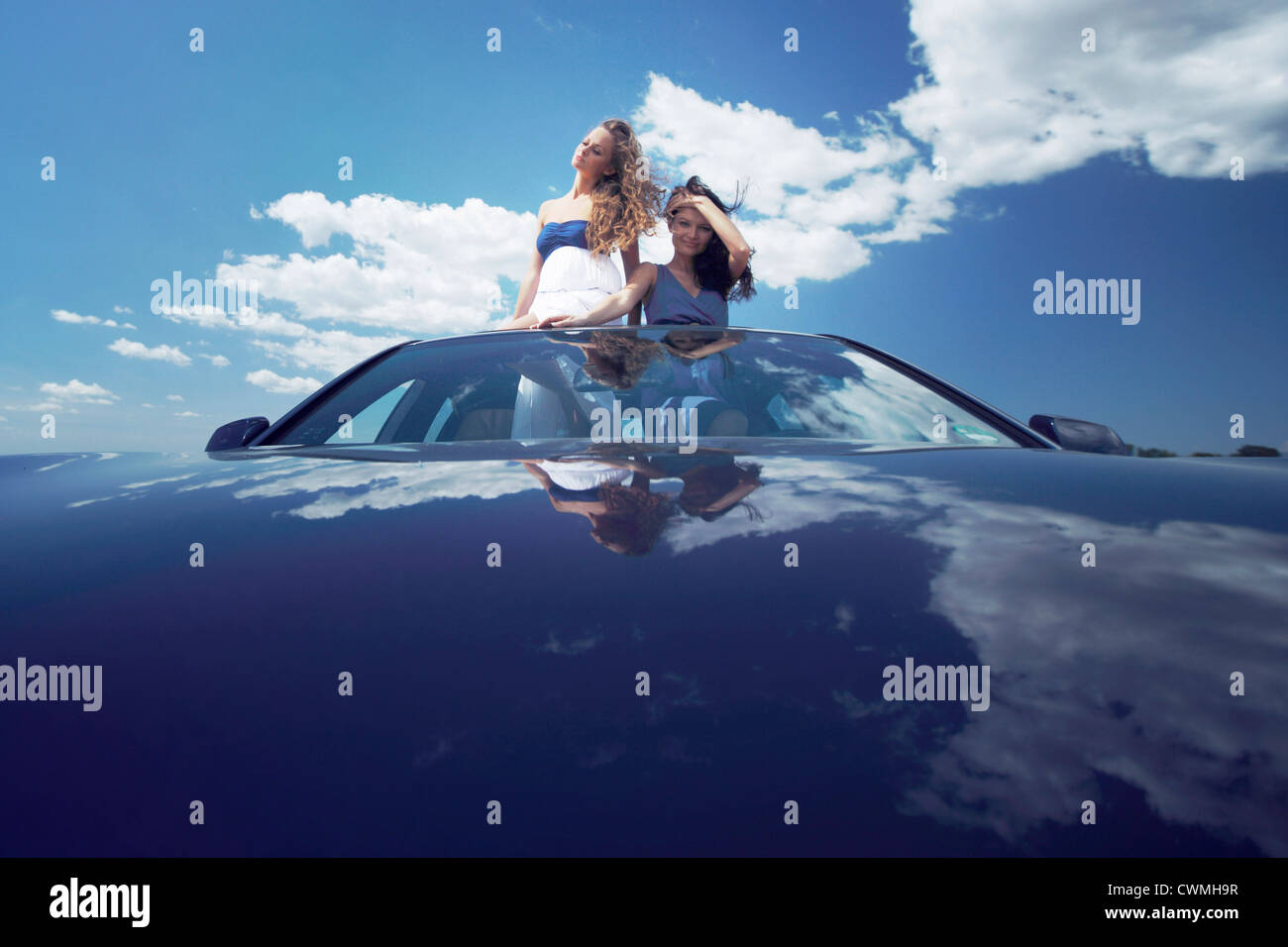 women dance in car Stock Photo - Alamy