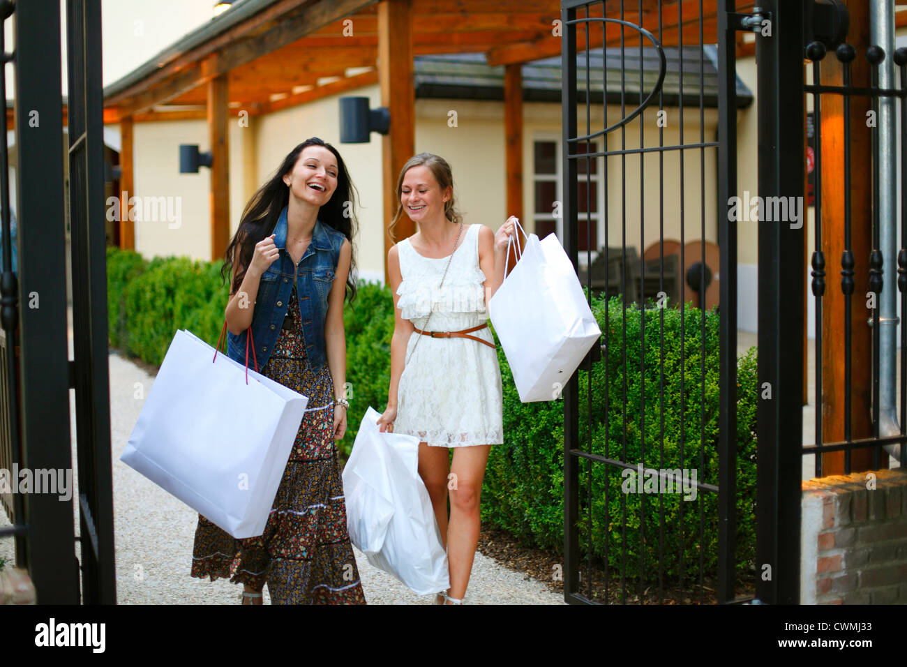Two woman shopping Stock Photo - Alamy